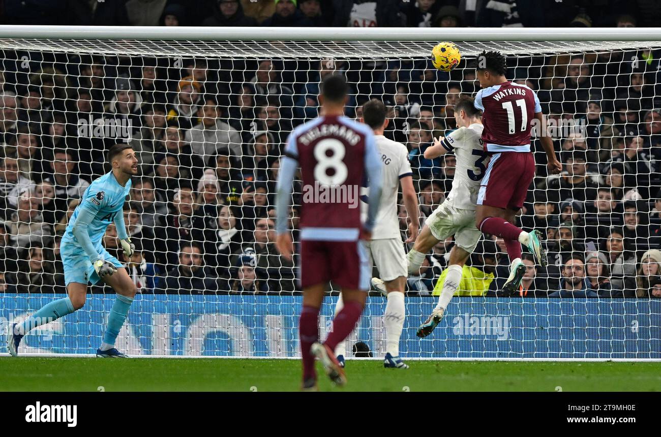 London, UK. 26th Nov, 2023. Ollie Watkins (Villa) jumps above Ben ...