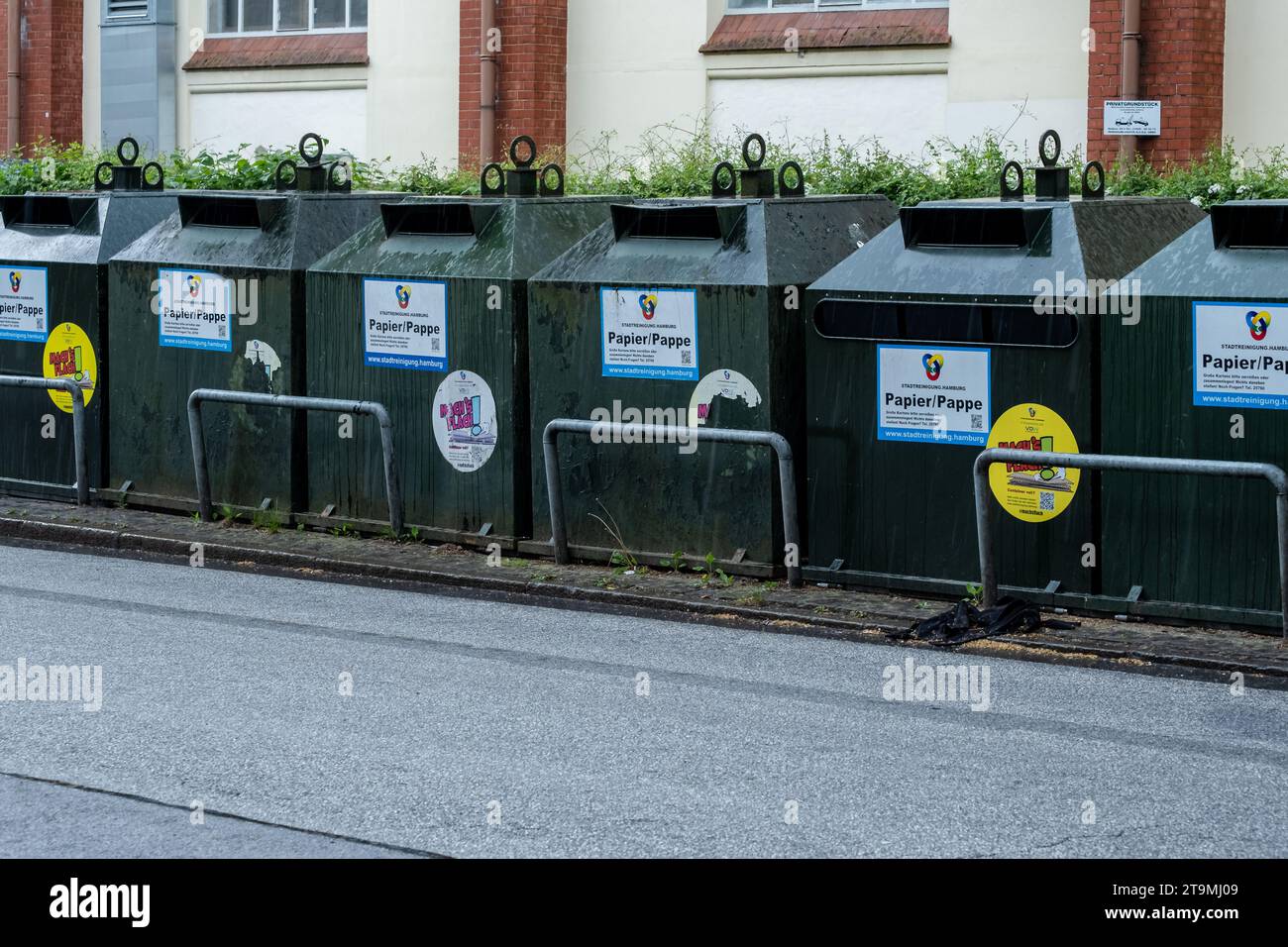 Hamburg, Germany - 05 15 2023: View of several large green containers ...