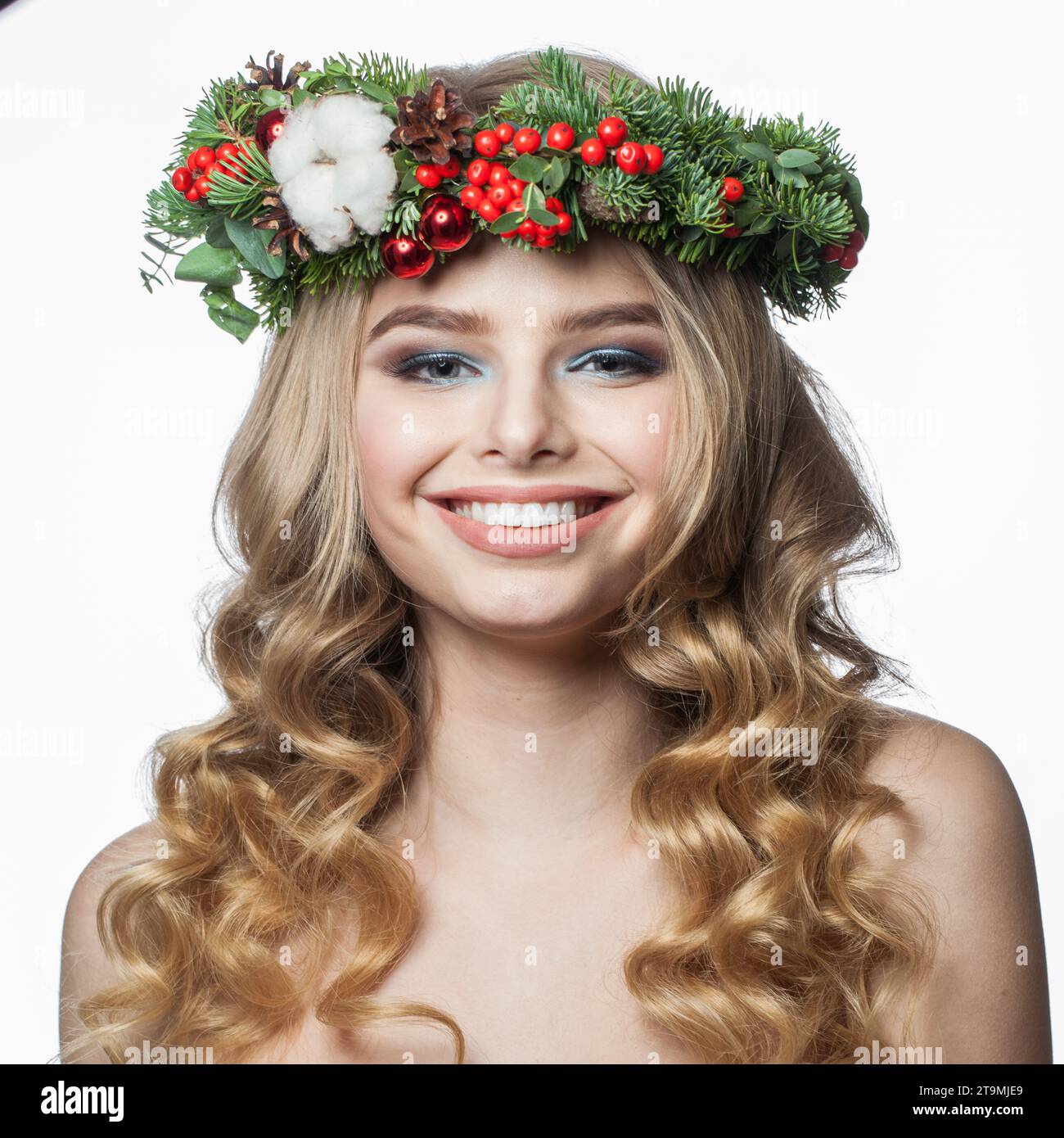 Pretty happy positive female model with long blonde curly hair and ...