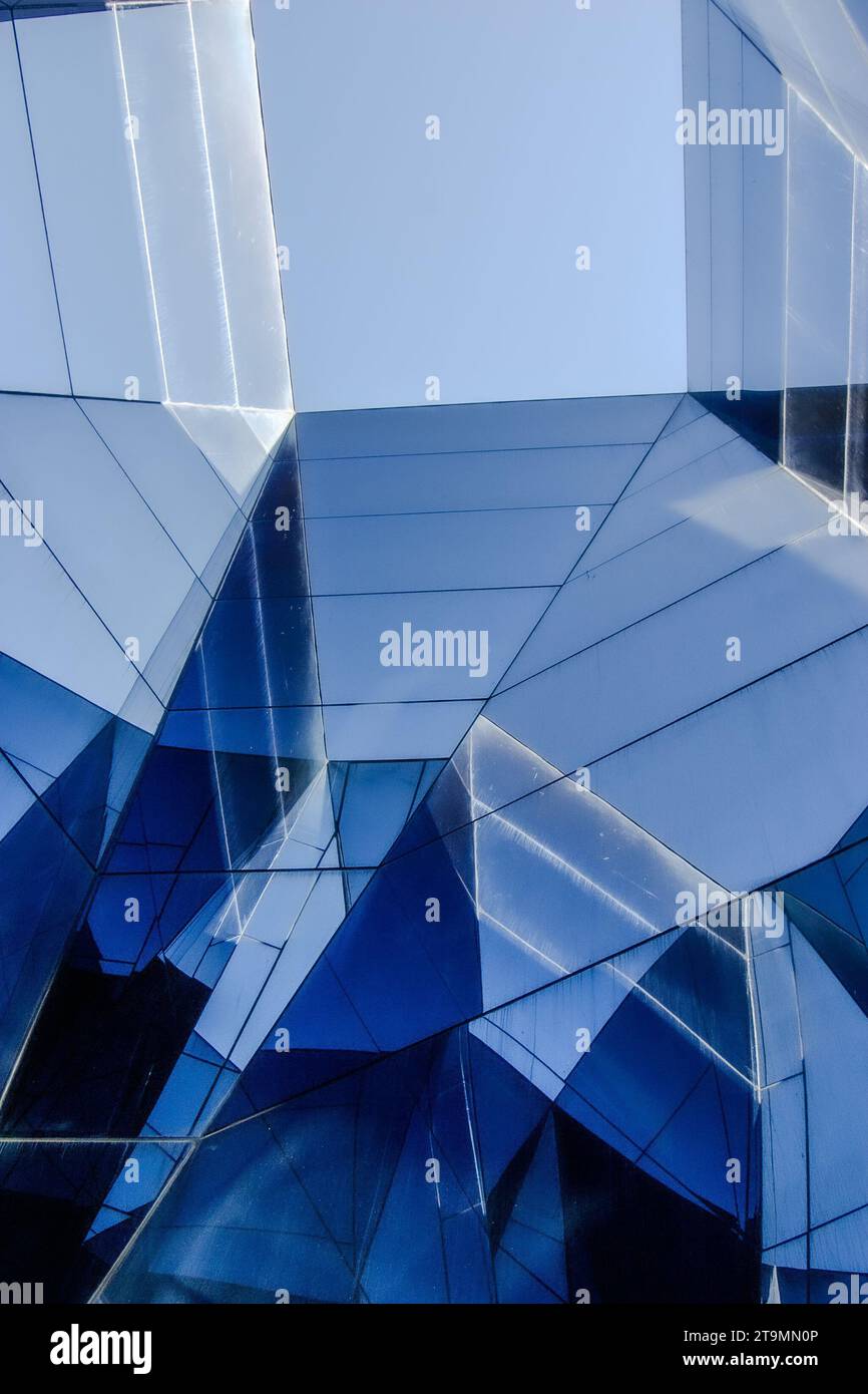 Two glass structures standing side by side, their square shapes and ...