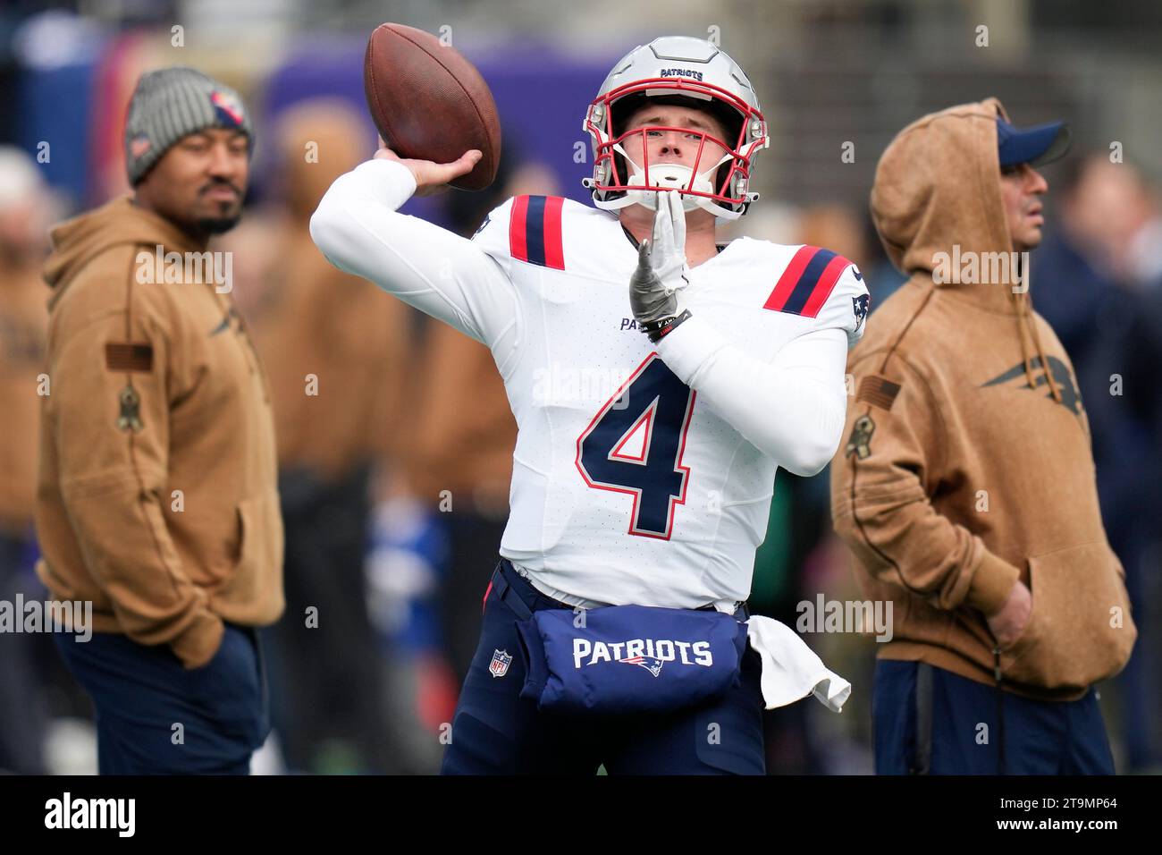 New England Patriots quarterback Bailey Zappe (4) warms up before ...
