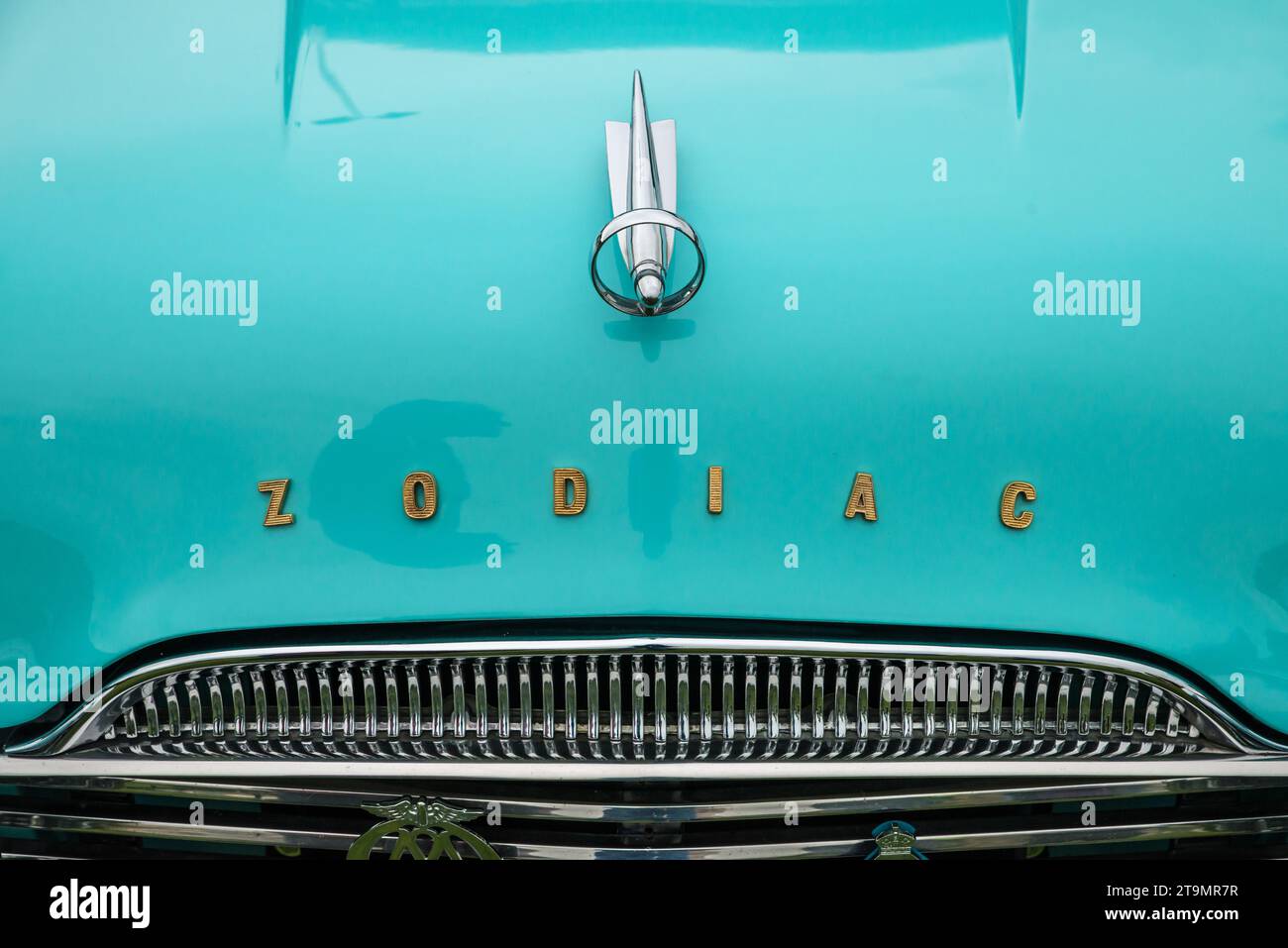 The bonnet (hood) of a blue Mark 2 Ford Zodiac showing the Zodiac badge ...