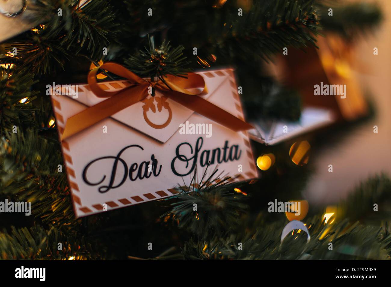 Magic paper letter with text Dear santa and silky ribbon hanging on the ...