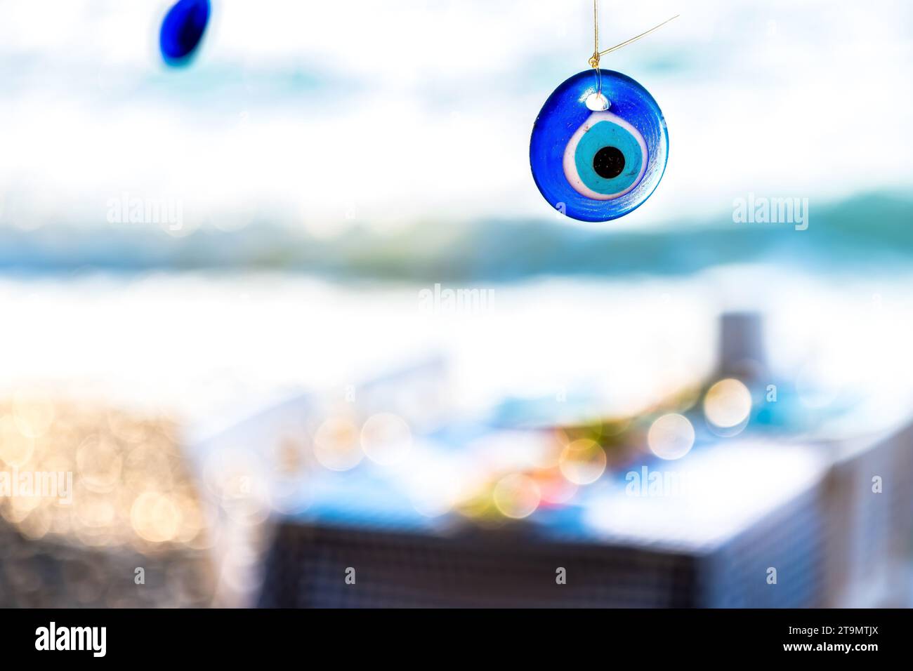 Evil eye bead made hi-res stock photography and images - Alamy