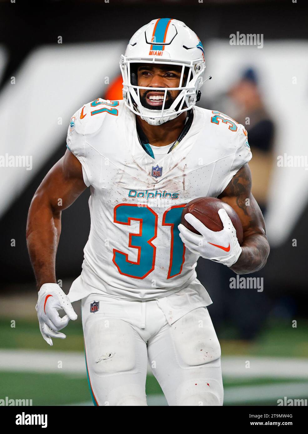 Miami Dolphins running back Raheem Mostert (31) smiles after scoring a touchdown against the New ...