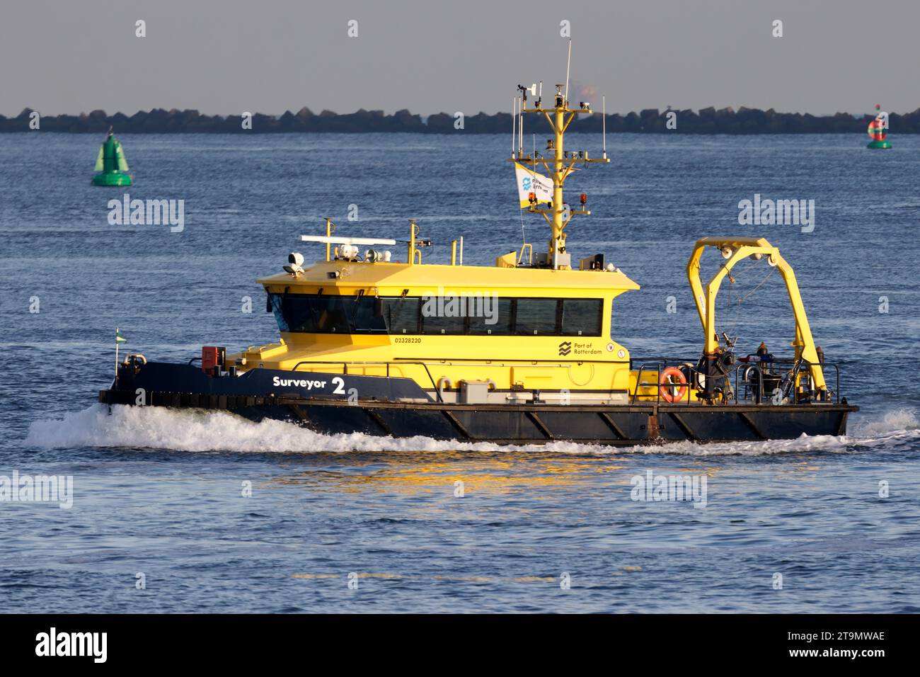 The government ship Surveyor 2 sails through the port of Rotterdam on ...