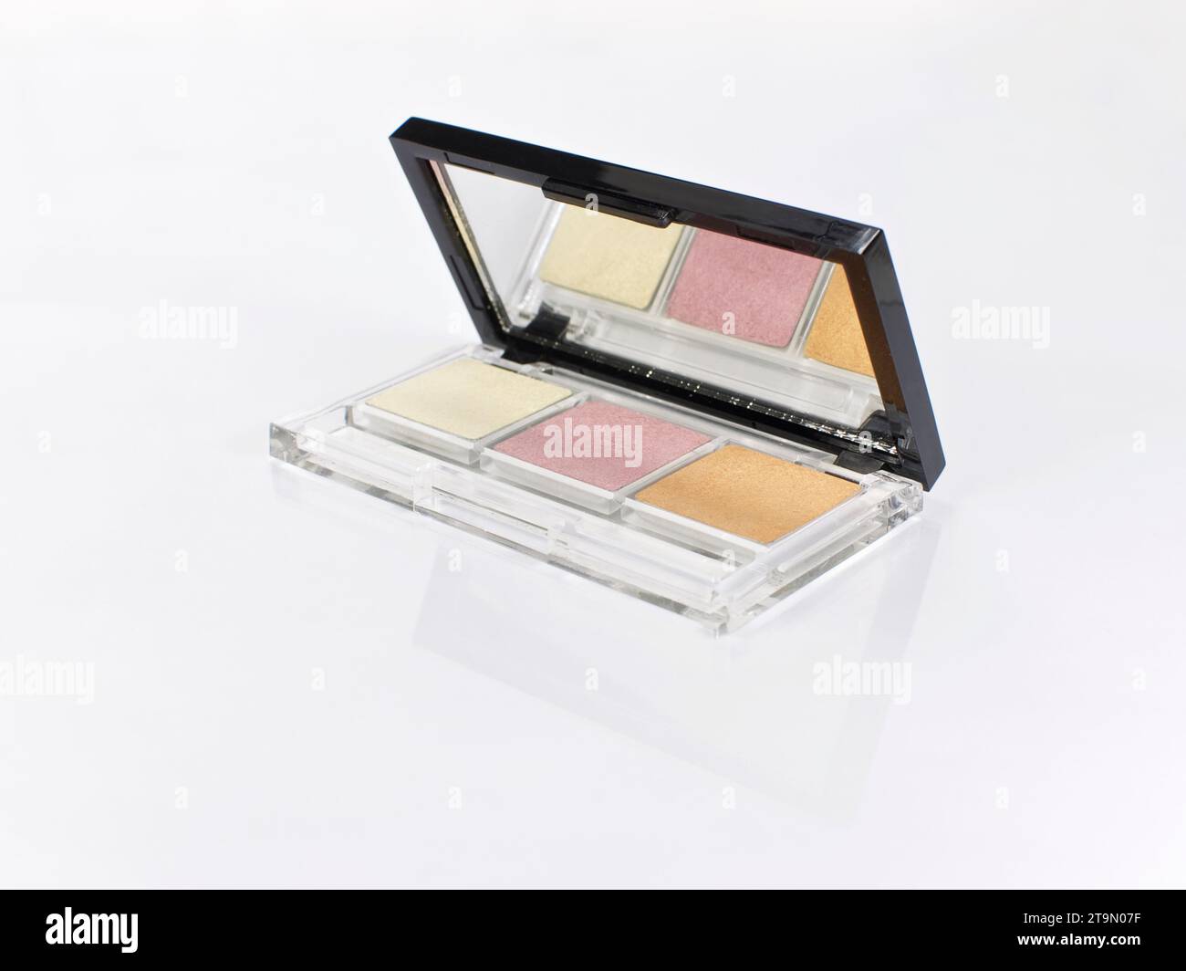 Three colour eyeshadows palette container with mirror. Makeup ...