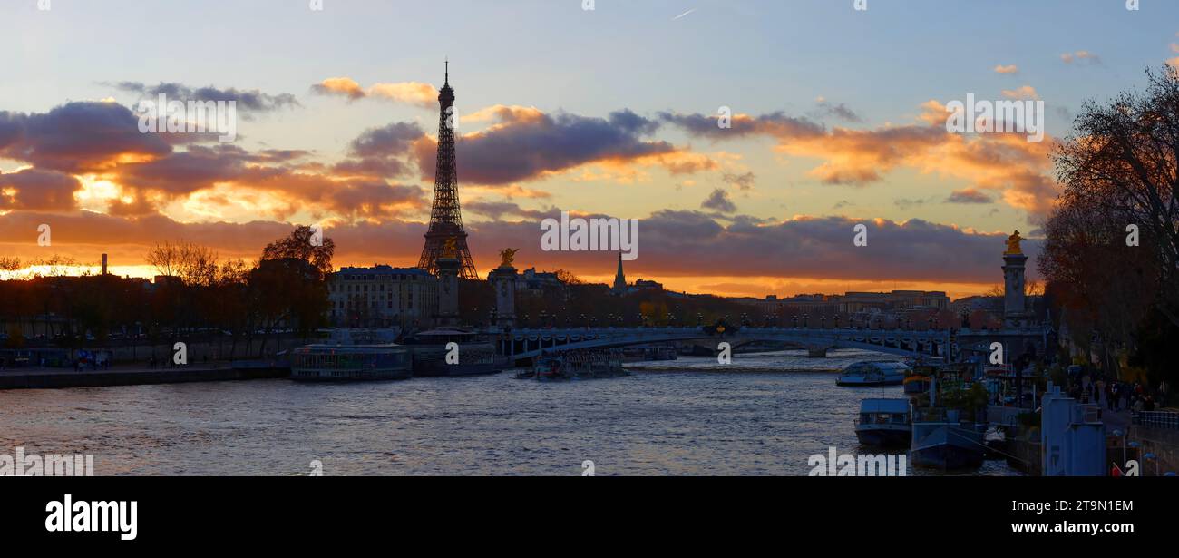 Paris skyline at sunset, with Eiffel tower, Alexandre III bridge, Seine ...
