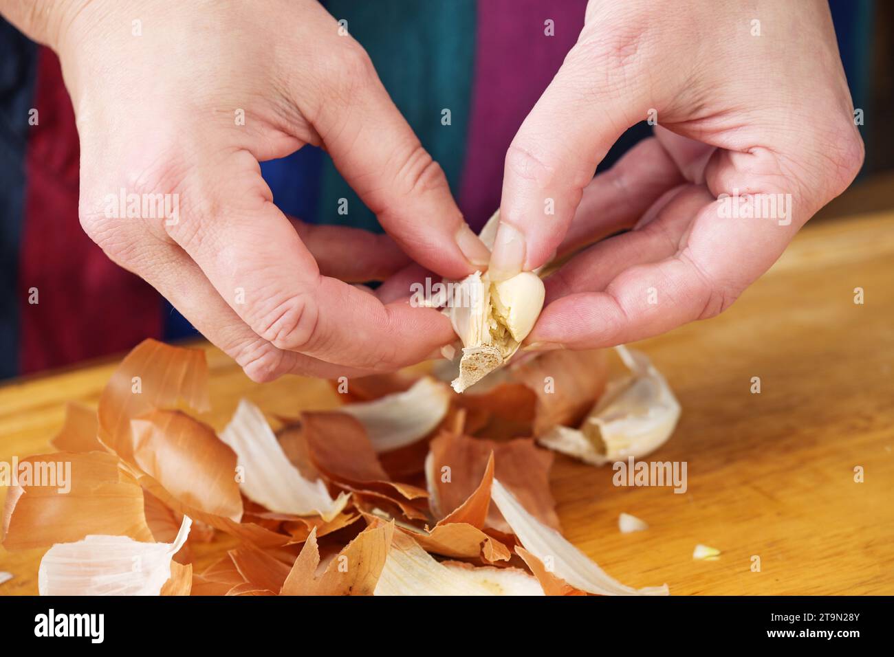 Peeling the onion hi-res stock photography and images - Alamy