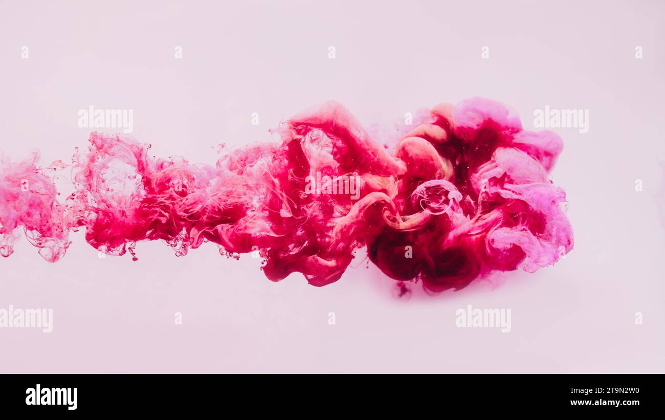 Color ink background drop magenta pink smoke mix Stock Photo - Alamy