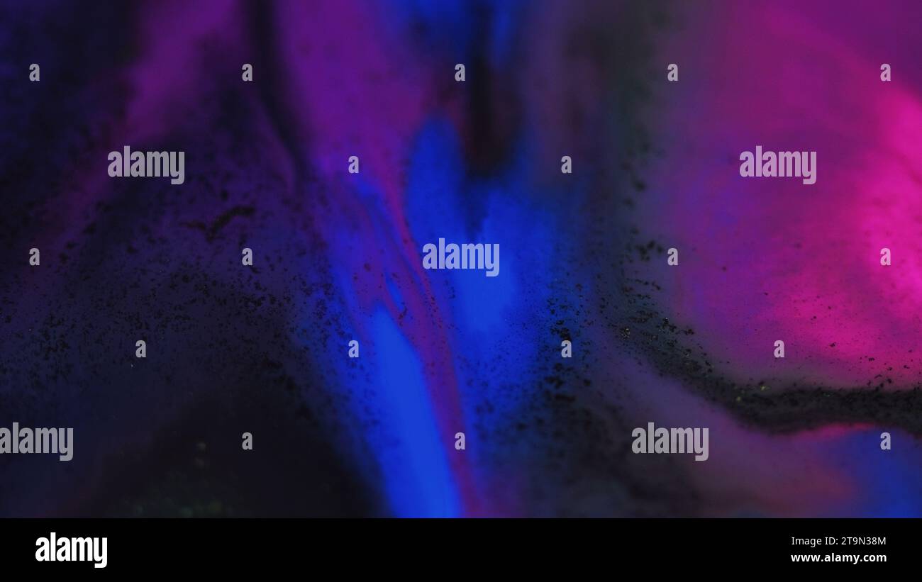 Paint splash glitter mist texture blue purple dark Stock Photo - Alamy