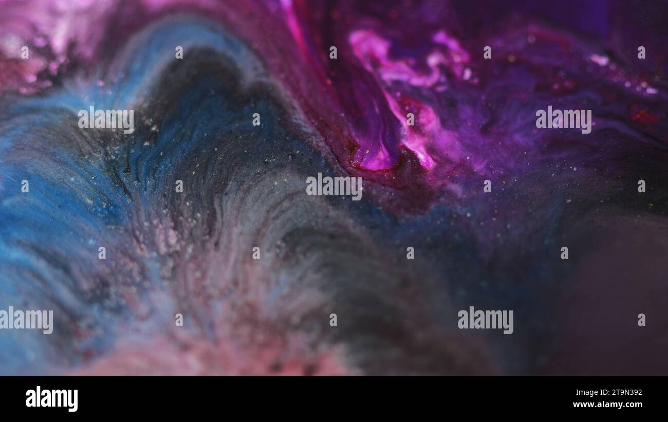 Paint blend ink water flow blue purple fluid wave Stock Photo - Alamy