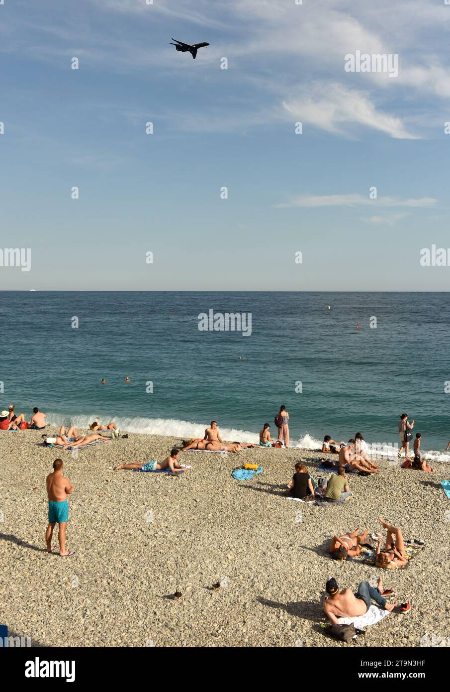 Nice, France - June 19, 2019: People rest on the beach of the Nice and ...