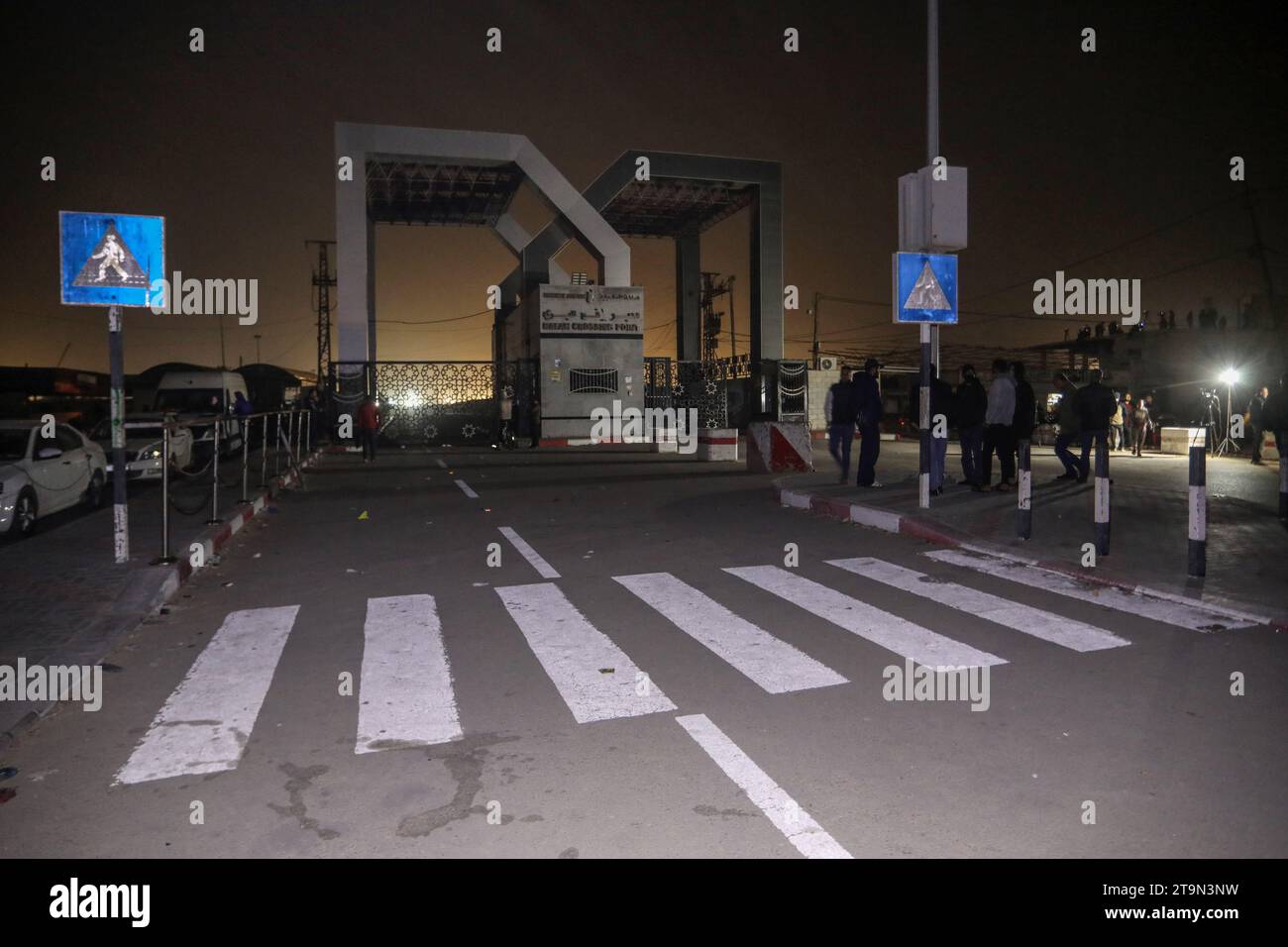 Rafah, Palestinian Territories. 26th Nov, 2023. Palestinians gather in ...