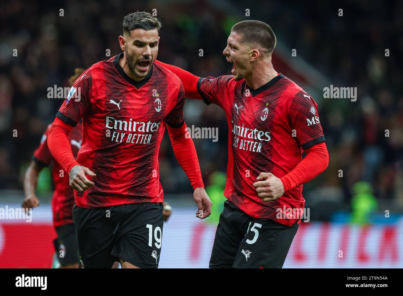 Theo Hernandez of AC Milan (L) celebrates after scoring a goal with ...