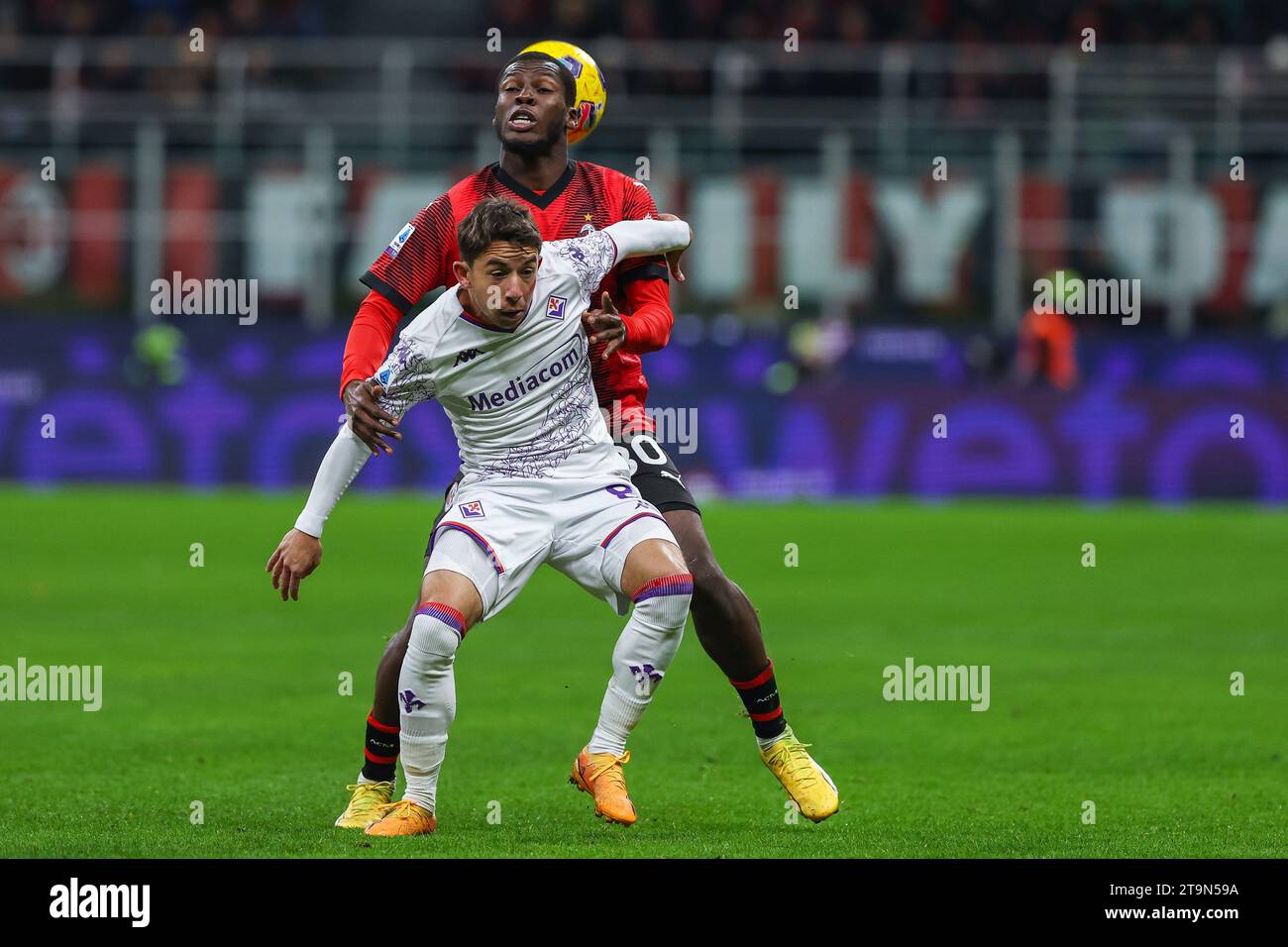 Yunus Musah of AC Milan and Maxime Lopez of ACF Fiorentina seen in action during the Serie A ...