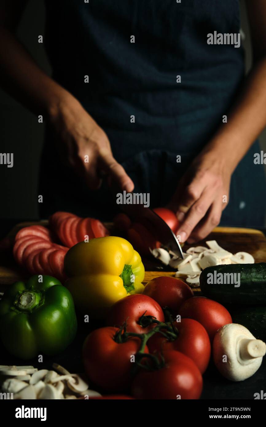 close-up of the chef's hands slicing champignons Stock Photo - Alamy