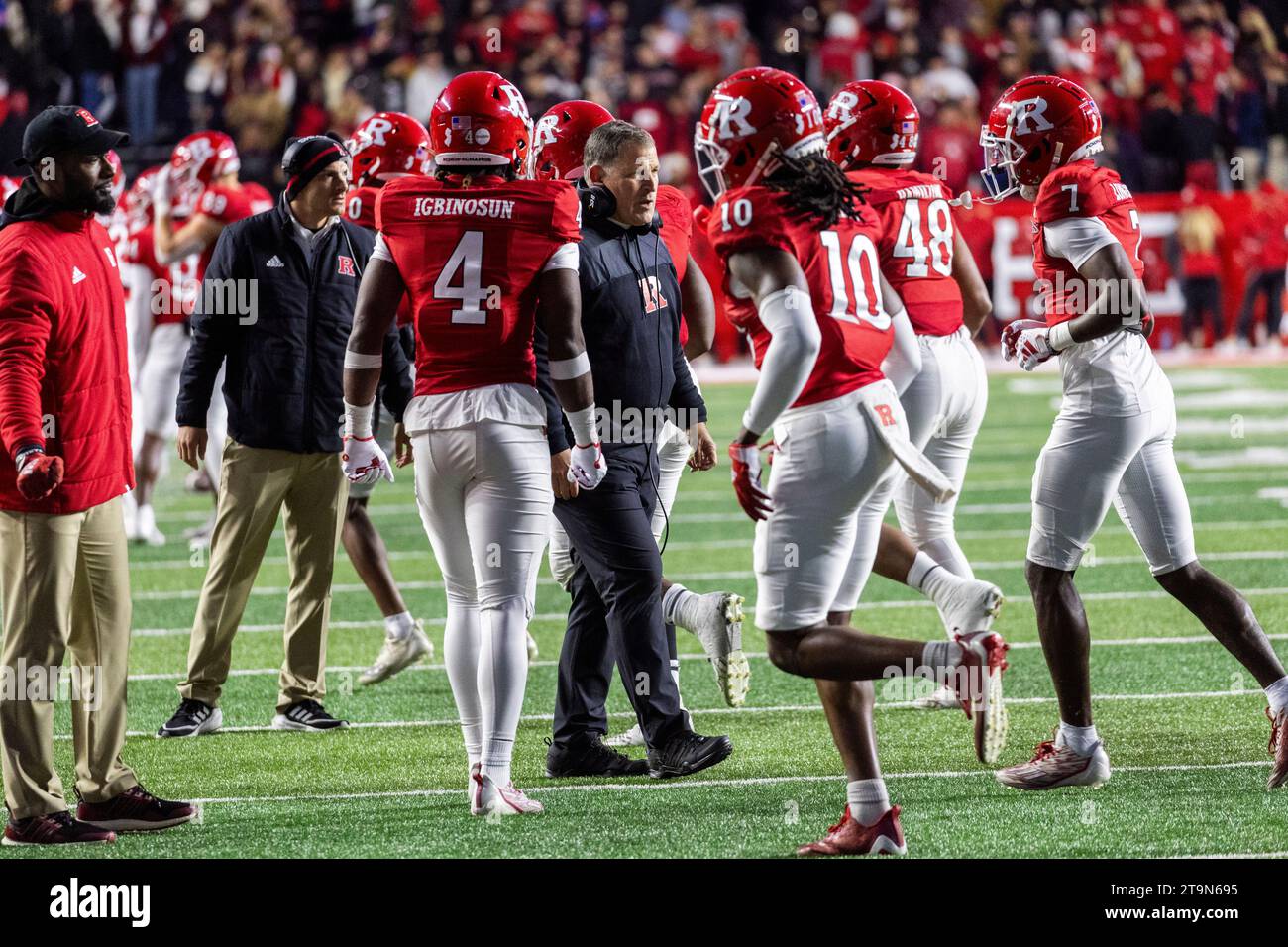 Rutgers head coach Greg Schiano talks to the team in the first half of ...
