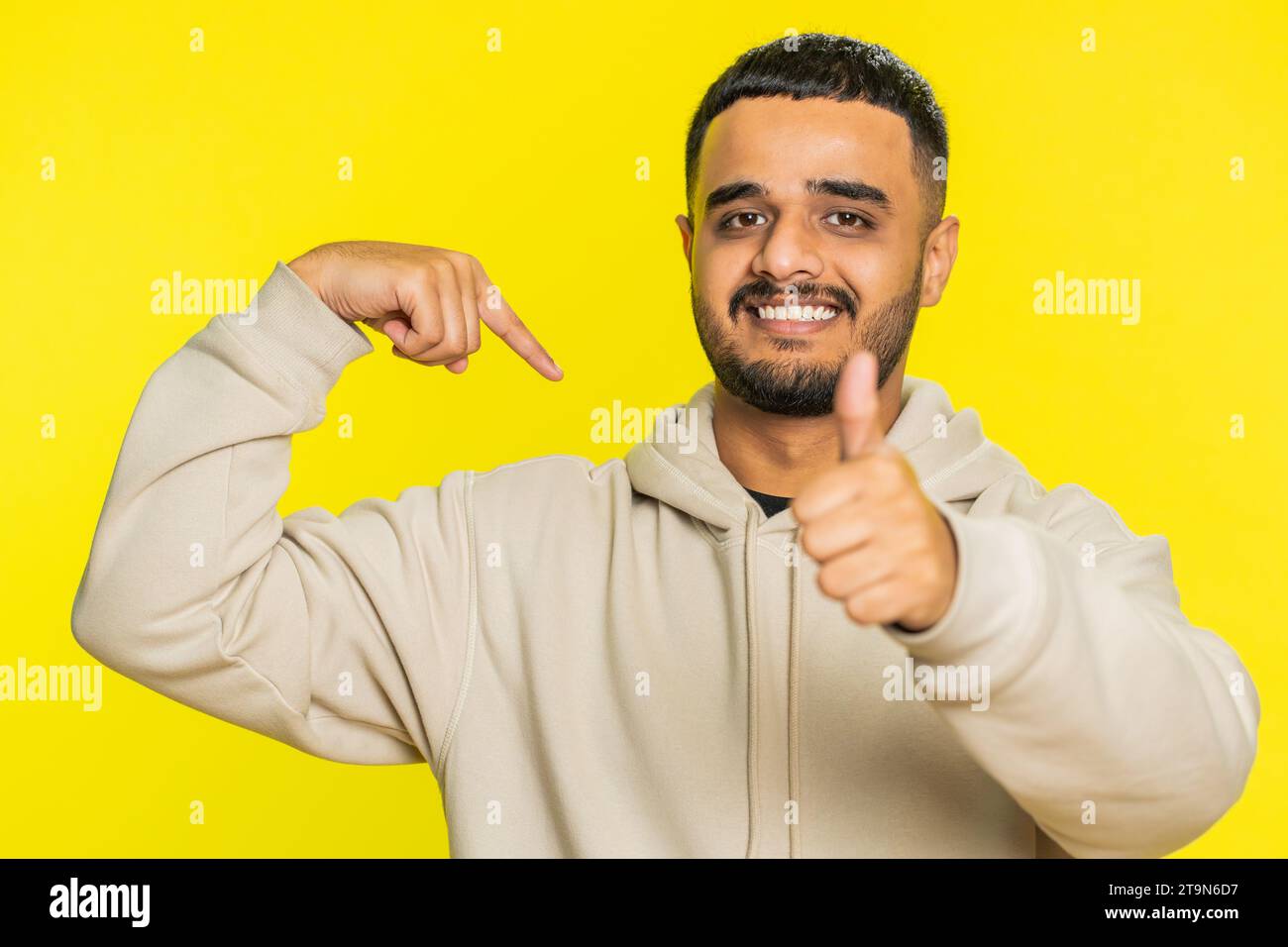 I am the best, choose me. Young excited Indian man winner feeling very ...