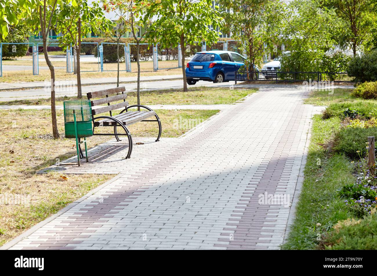 Rest area with bench. Place to rest in the city park Stock Photo - Alamy