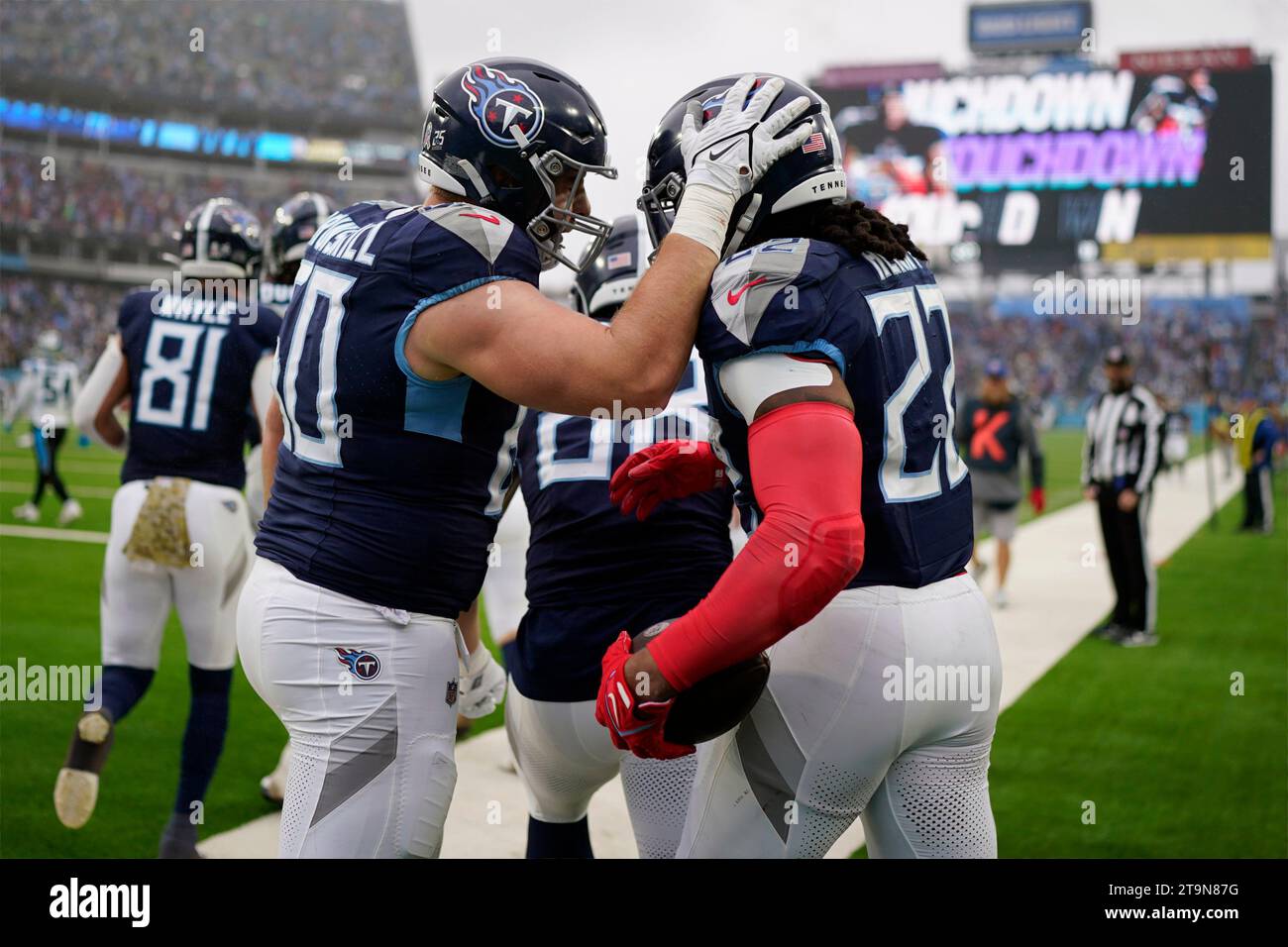 Tennessee Titans running back Derrick Henry (22) is congratulated by ...
