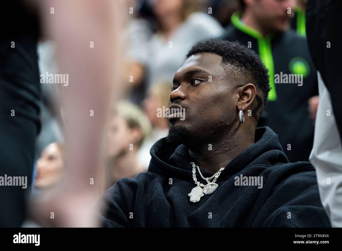 New Orleans Pelicans forward Zion Williamson sits on the bench in the ...