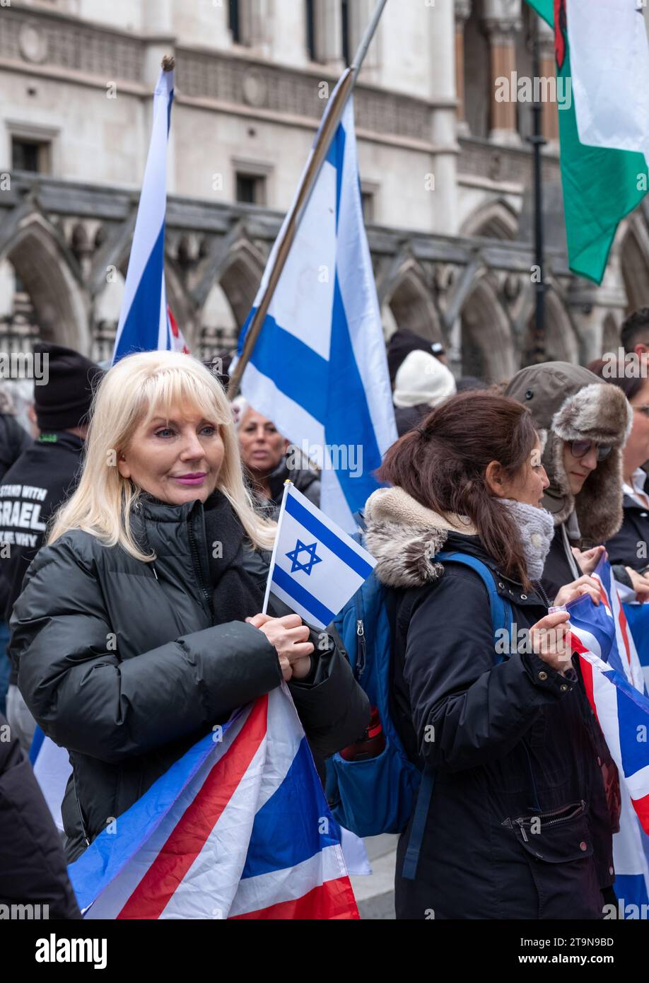 Woman supporter holding Israeli flag, at the March Against Antisemitism ...