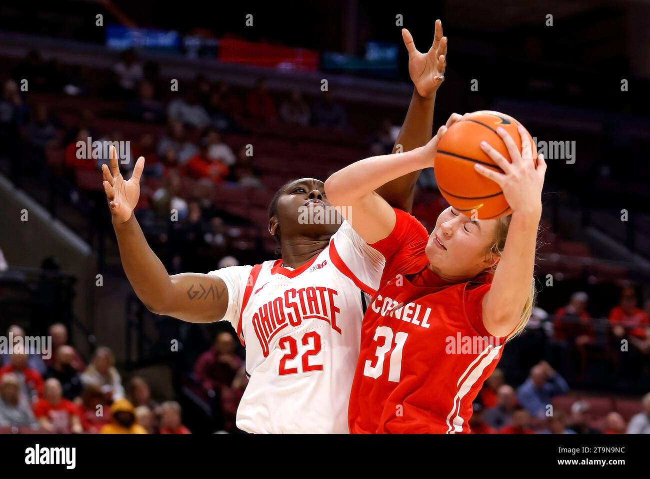 Cornell forward Emily Pape (31) grabs a rebound away from Ohio State ...
