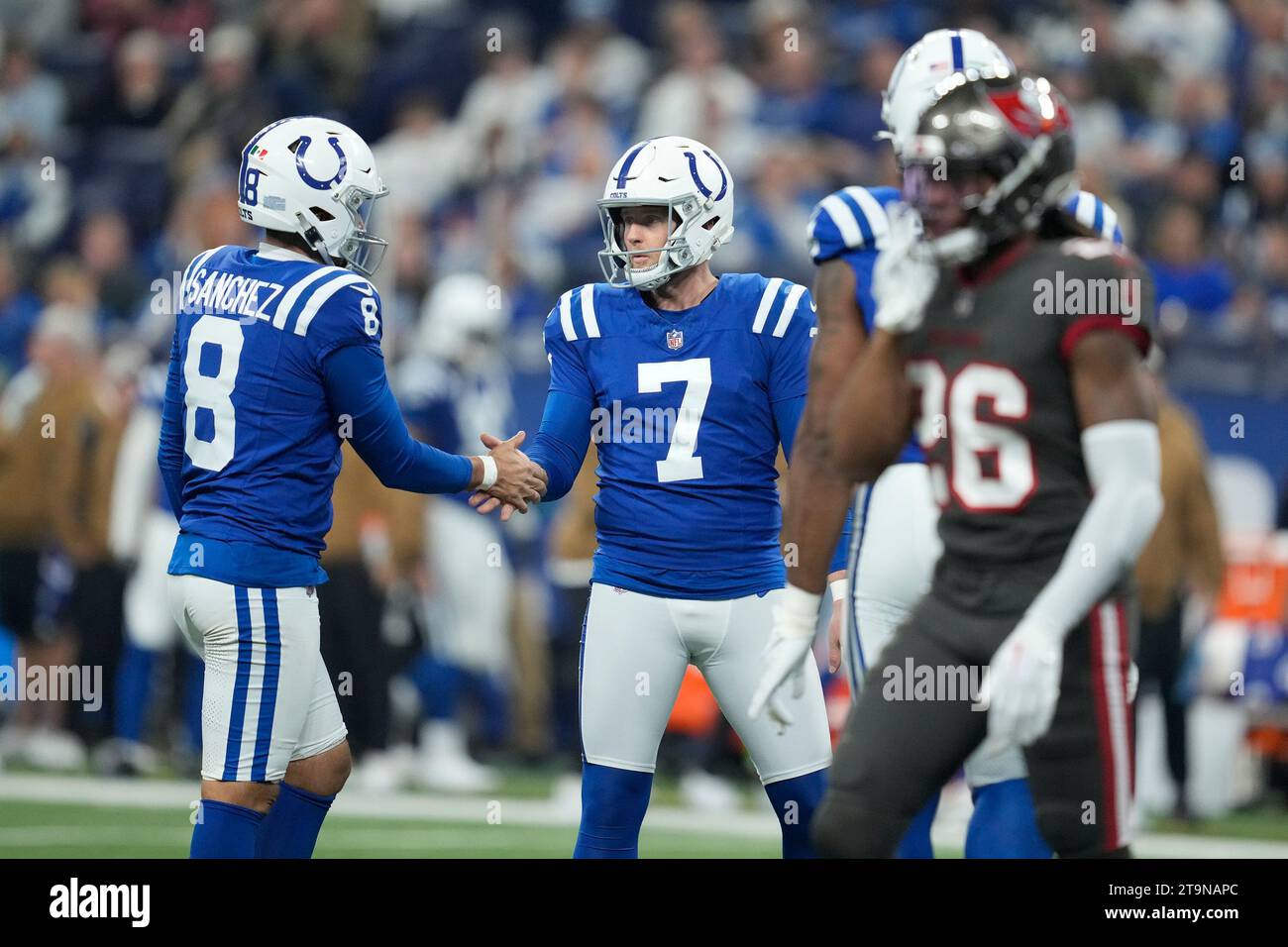 Indianapolis Colts punter Rigoberto Sanchez (8) congratulates place ...
