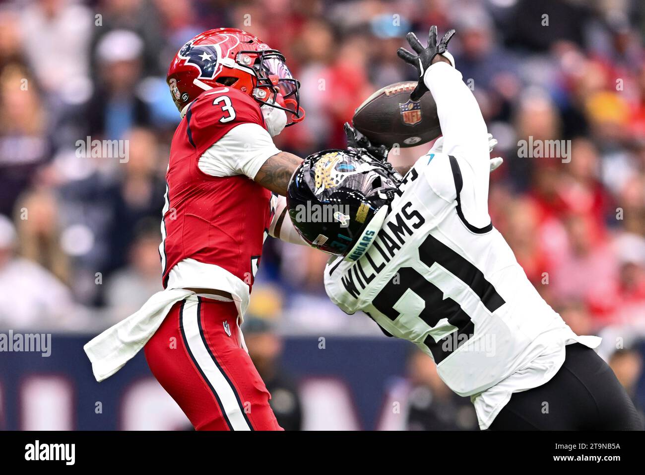 Houston Texans wide receiver Tank Dell (3) and Jacksonville Jaguars ...