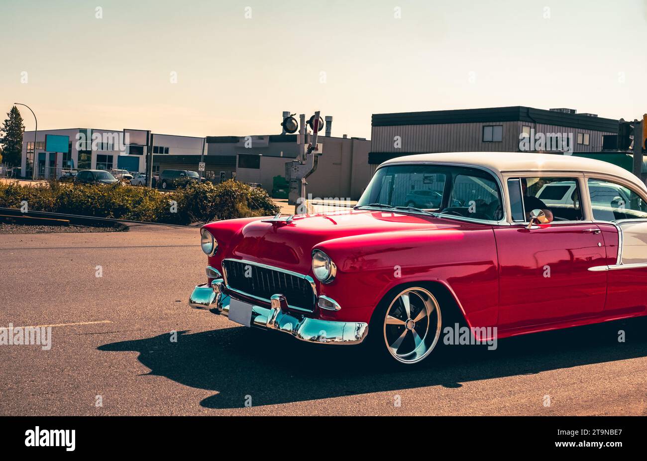 Driving a Vintage Red Car. Classic red car traveling in the countryside ...