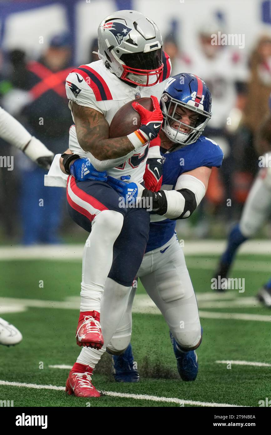 New York Giants linebacker Micah McFadden (41) tackles New England ...