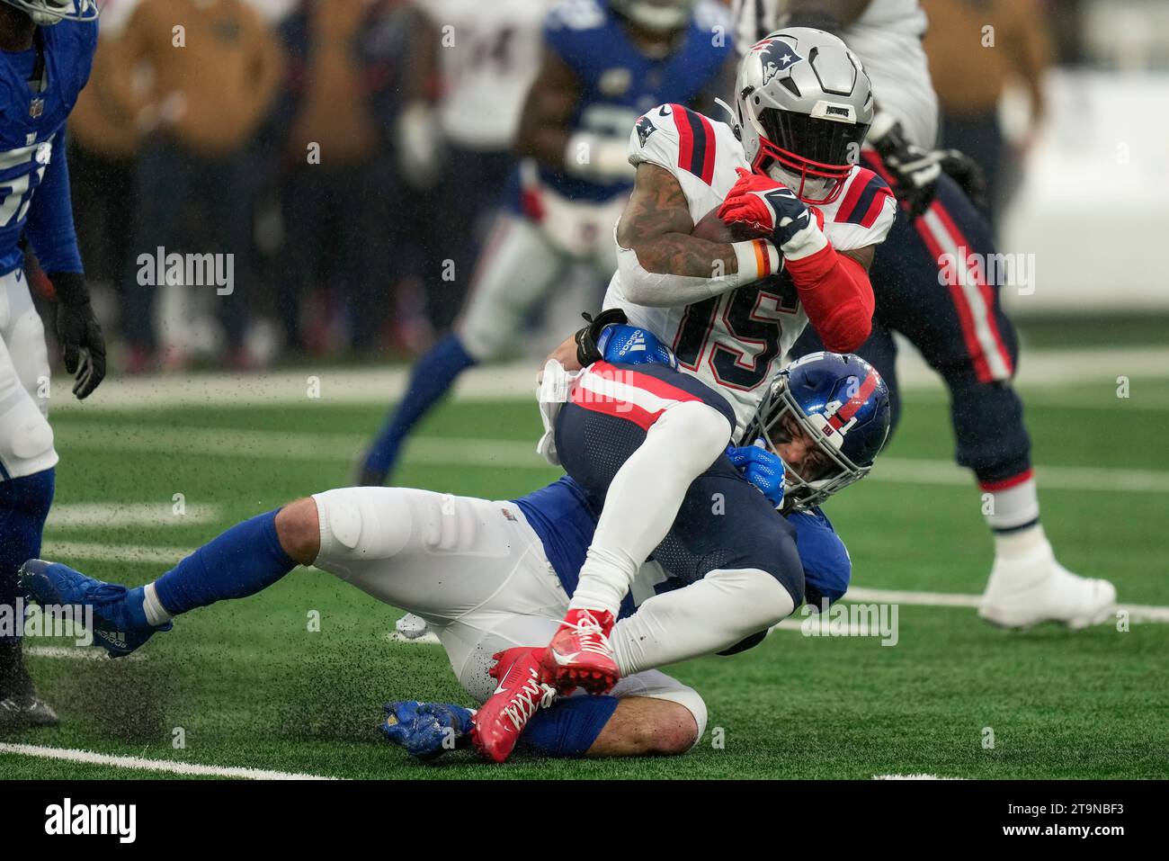 New York Giants linebacker Micah McFadden (41) tackles New England ...