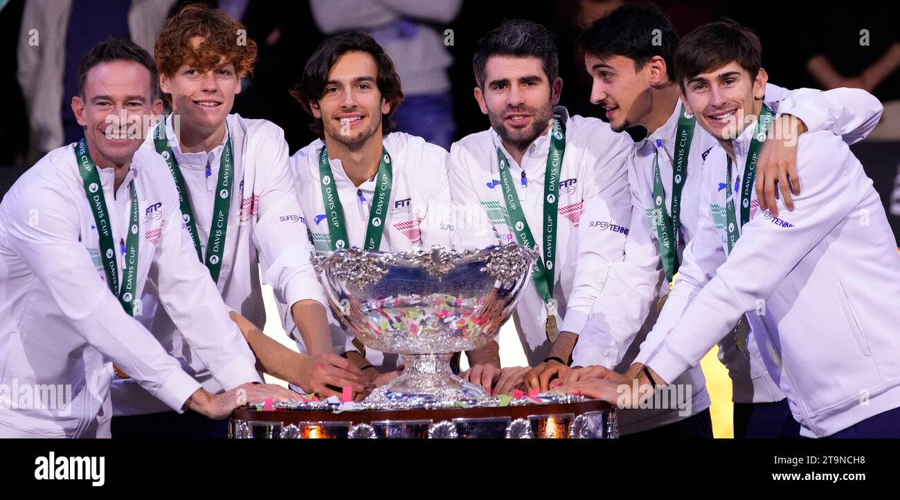 The Italian Davis Cup team pose with the trophy after defeating ...