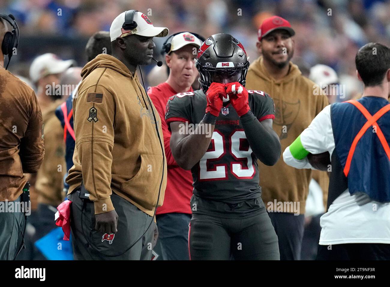 Tampa Bay Buccaneers head coach Todd Bowles, left, stands on the sidelines with safety Christian ...