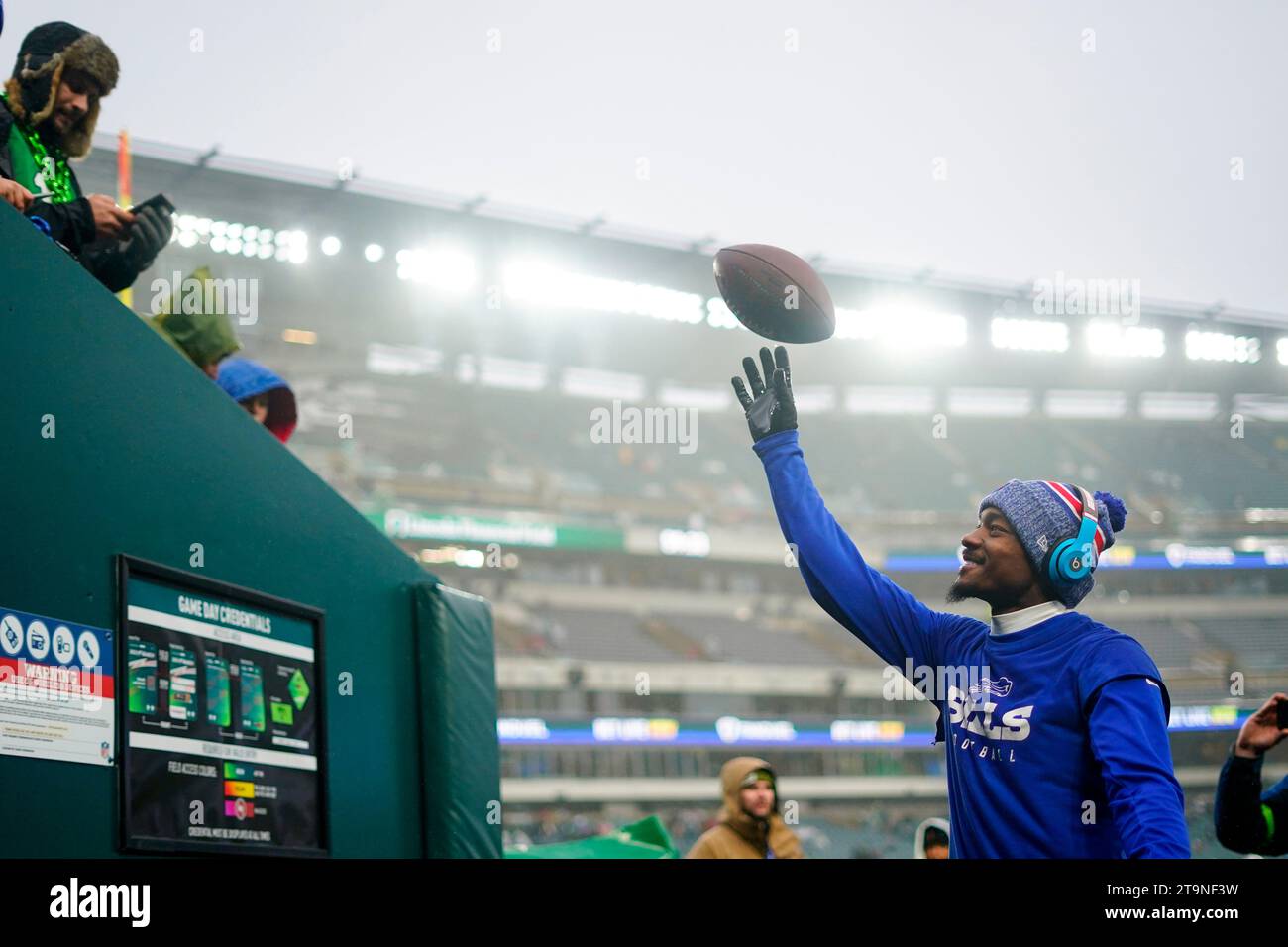 Buffalo Bills wide receiver Stefon Diggs tosses a ball to a fan before ...