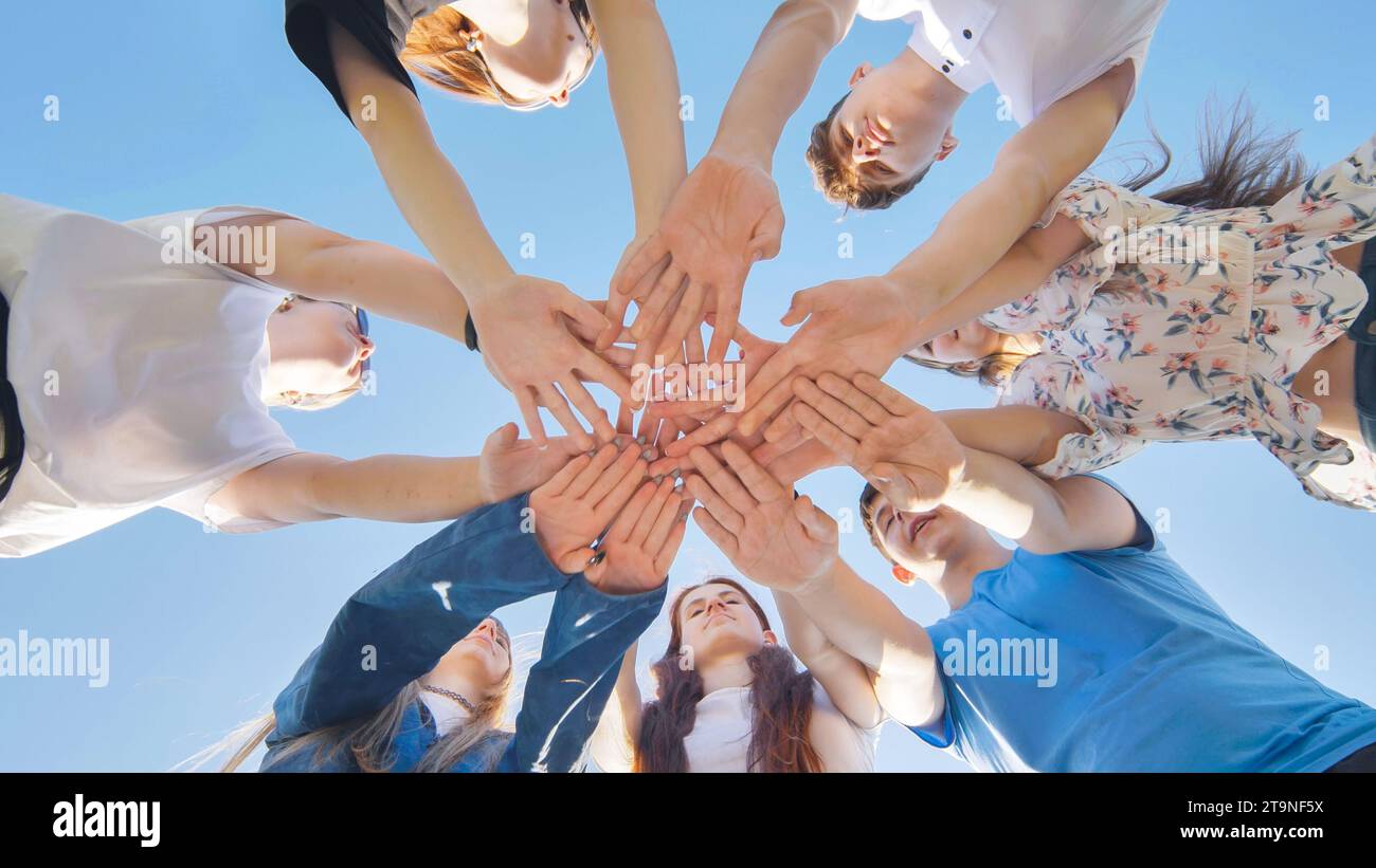 Team hands friends colleagues hi-res stock photography and images - Alamy