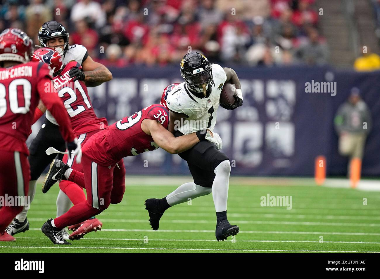 Jacksonville Jaguars running back Travis Etienne Jr. (1) runs the ball ...
