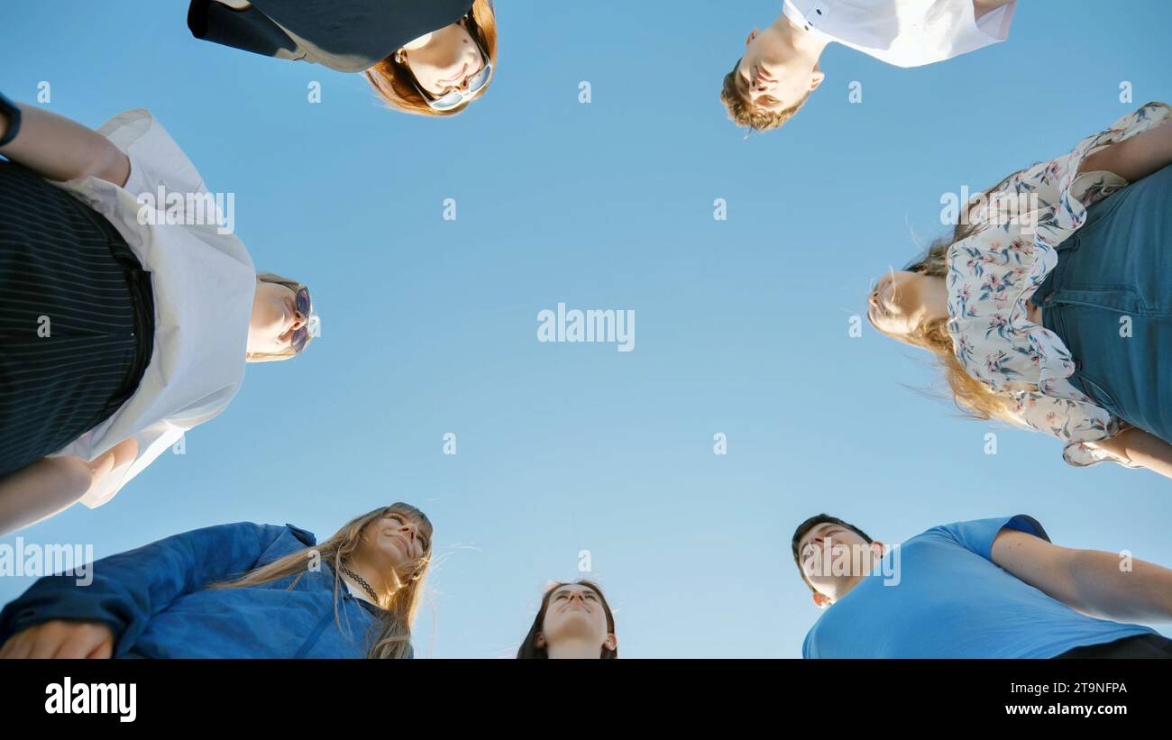 Celebrate young people standing circle hi-res stock photography and ...