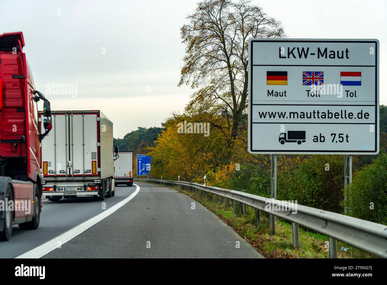 Sign for the lorry toll, on the A40 motorway, just after the German ...