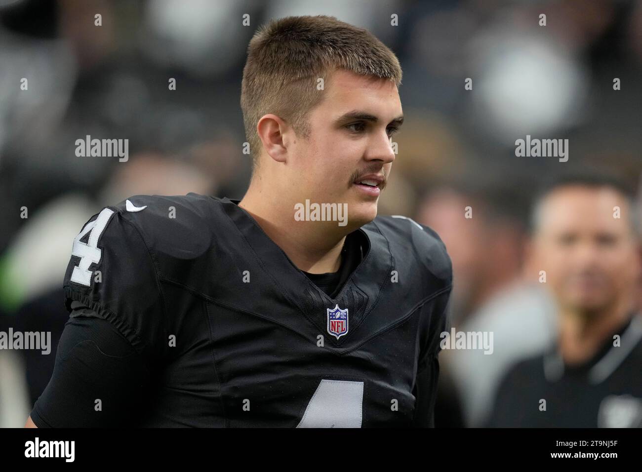 Las Vegas Raiders quarterback Aidan O'Connell (4) warms up before an ...