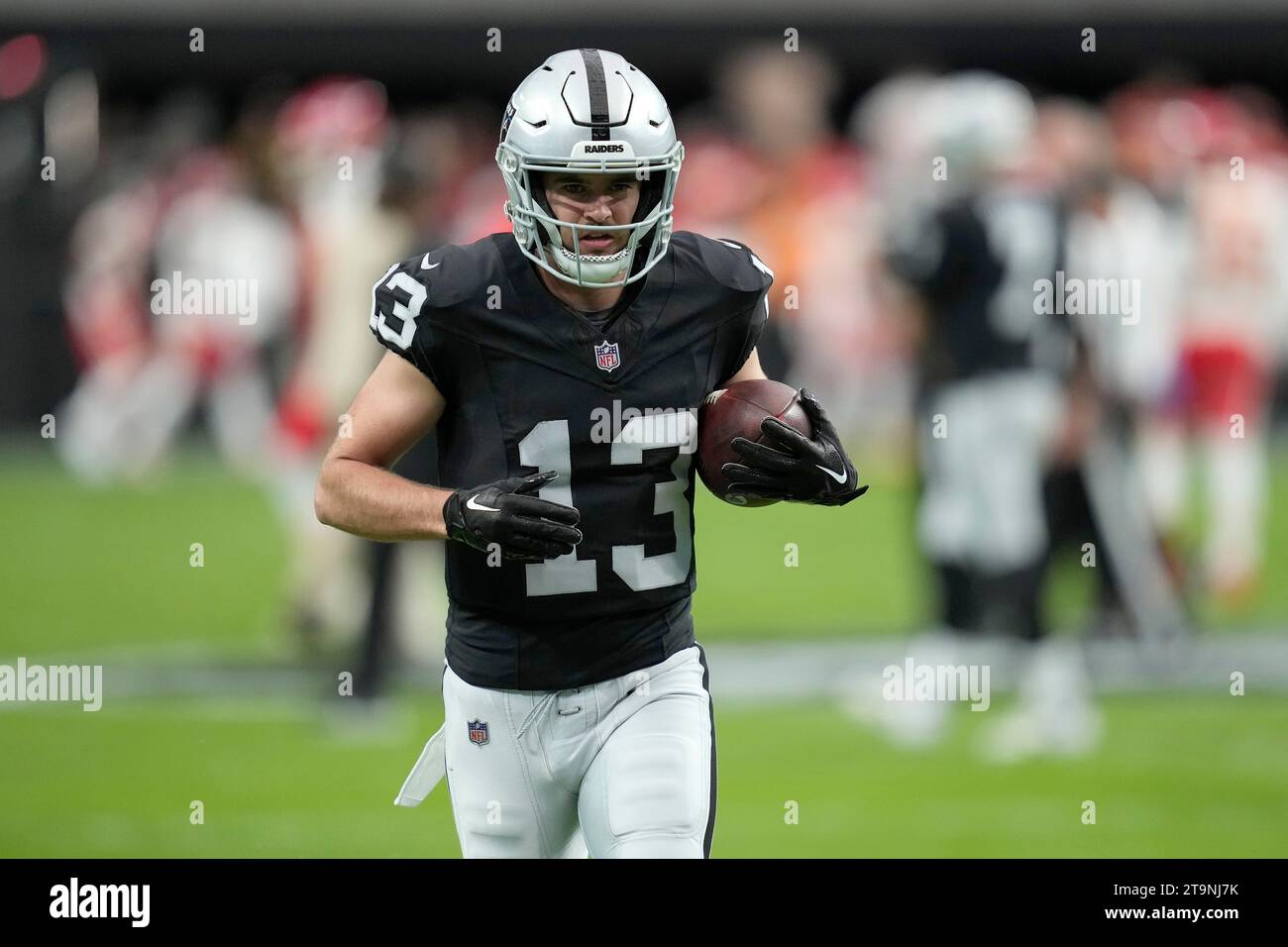 Las Vegas Raiders wide receiver Hunter Renfrow (13) warms up before an ...