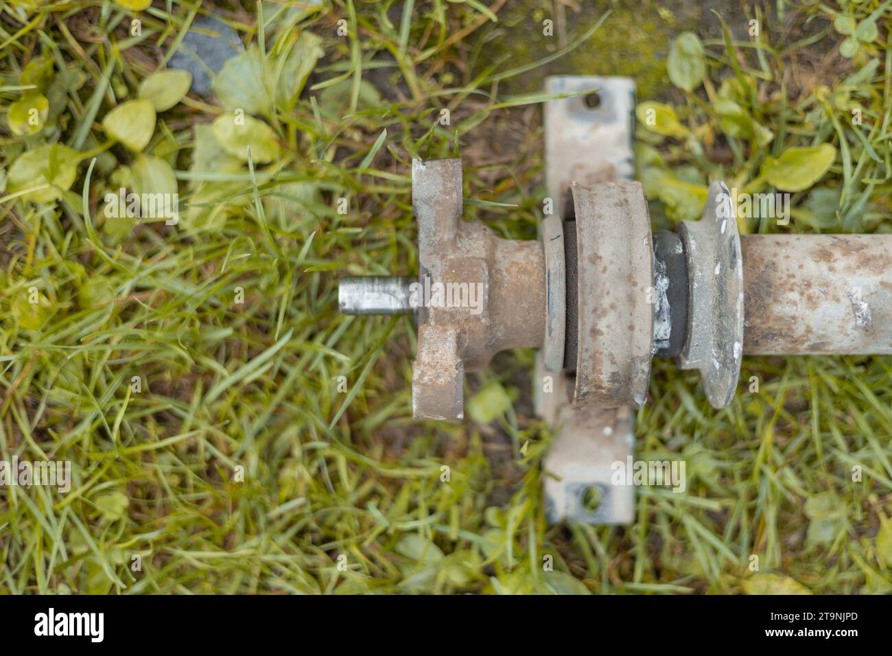 Central bearing and shell from a propeller shaft. Removed from a car ...