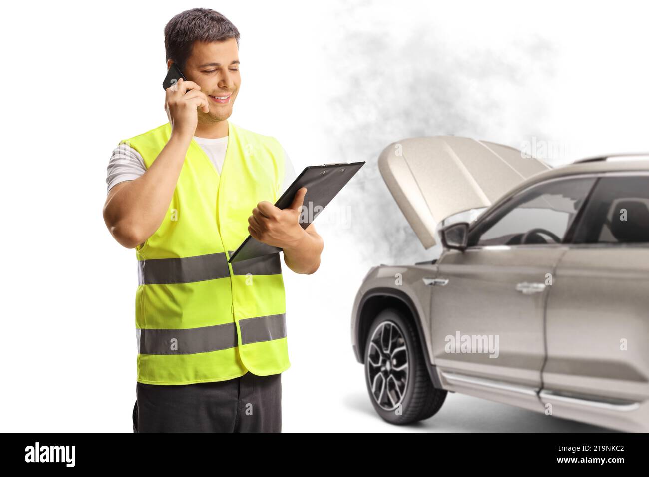 Car service worker with a smartphone standing next to a SUV with open ...