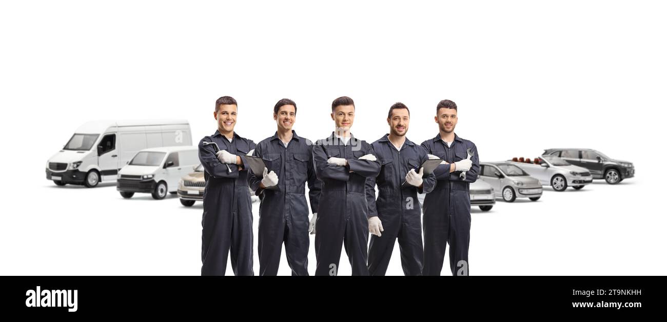 Team of auto mechanic workers in uniforms standing in front of parked ...