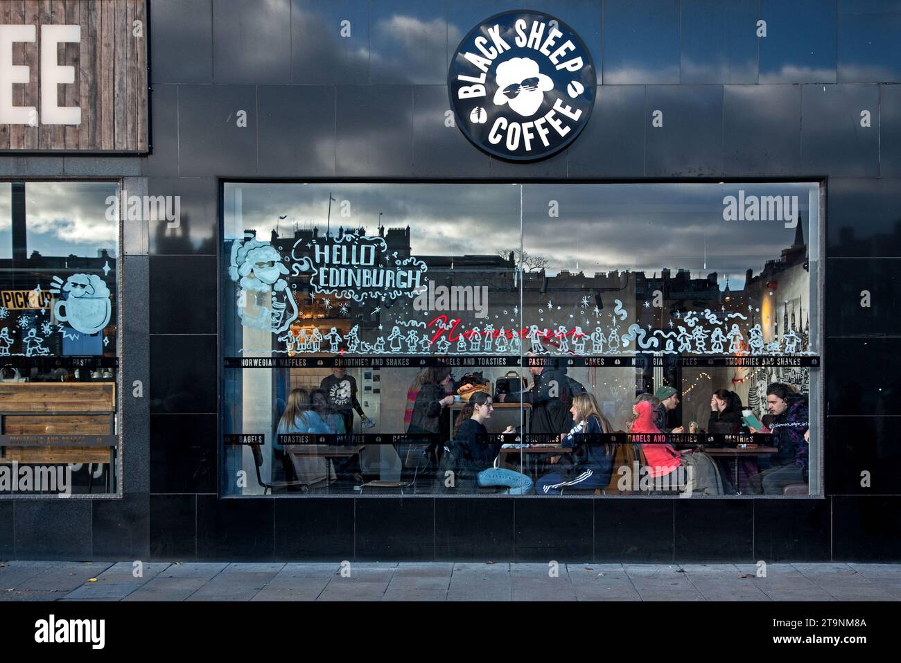 Customers sitting at the window of Black Sheep Coffee on Princes Street ...