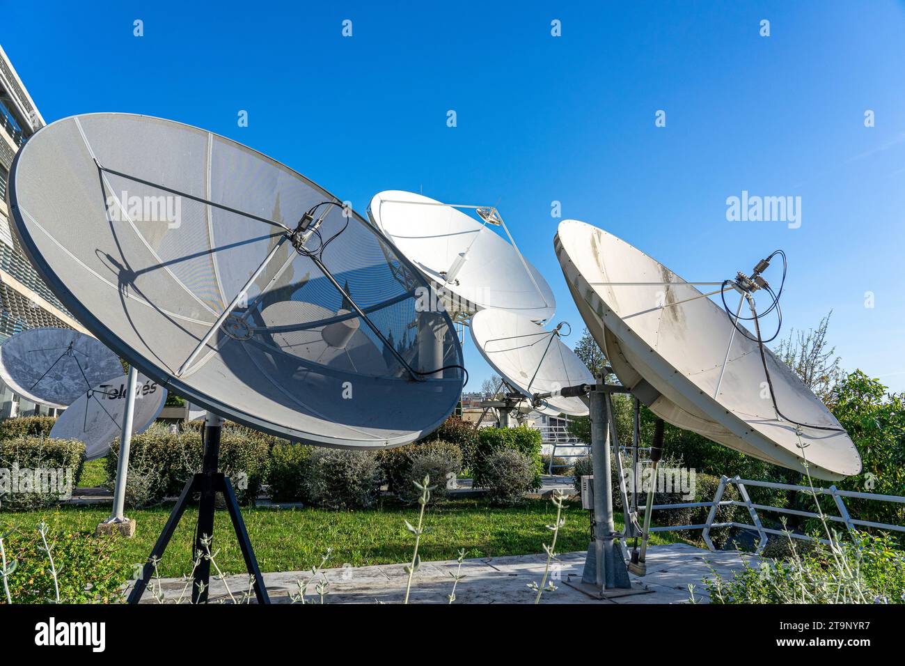 satellite dishes in the outer atrium of the headquarters building of ...