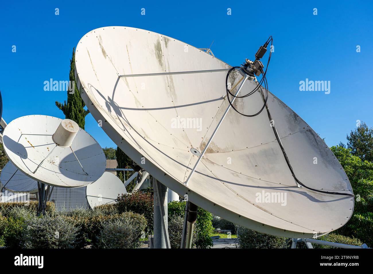satellite dishes in the outer atrium of the headquarters building of ...