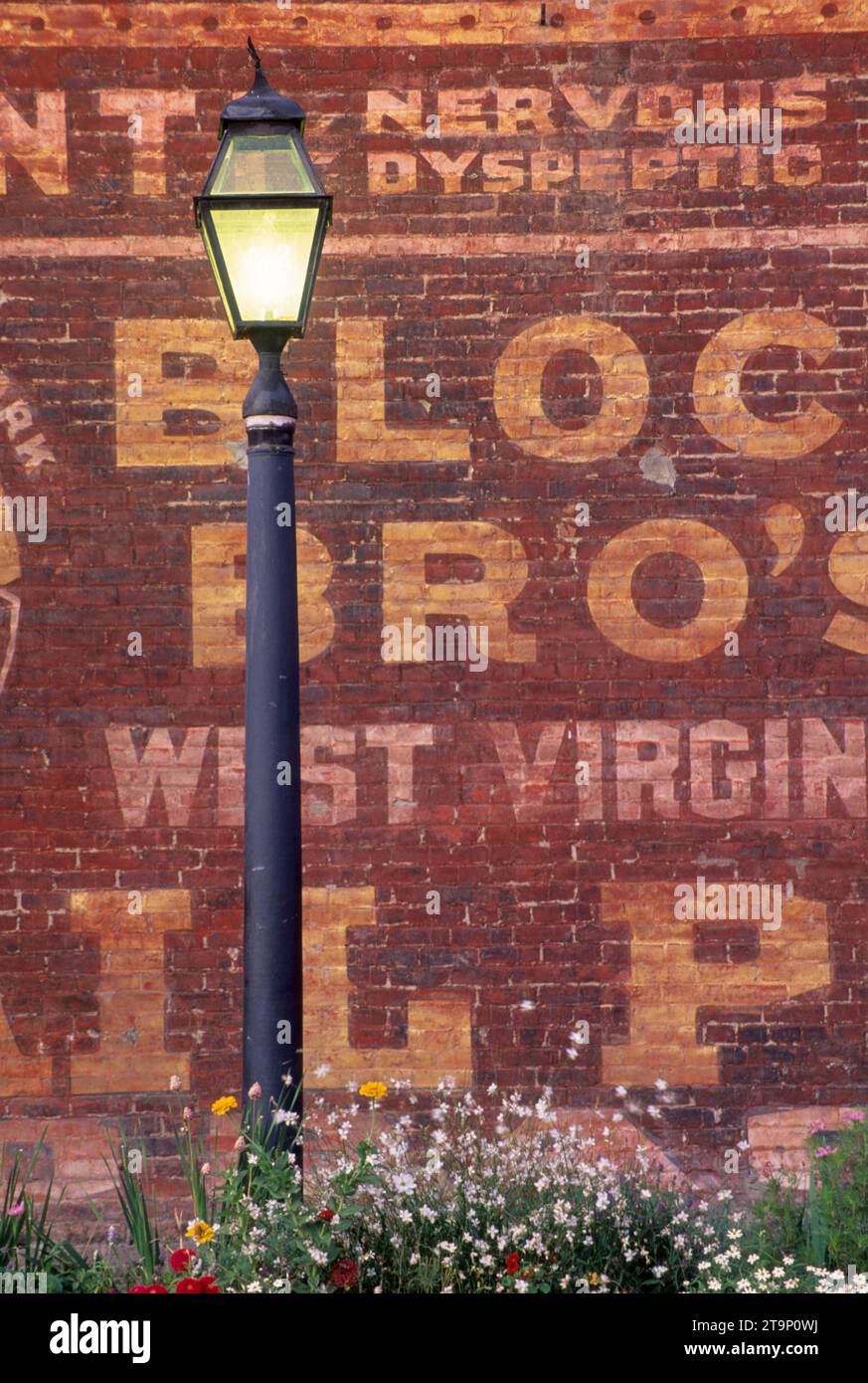 Painted brick advertisement with streetlamp, Jacksonville, Oregon Stock ...