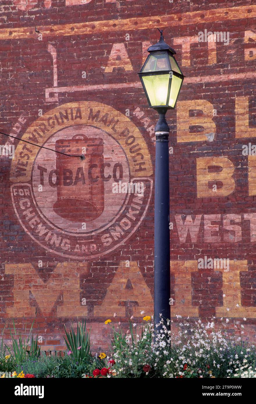Painted brick advertisement with streetlamp, Jacksonville, Oregon Stock ...